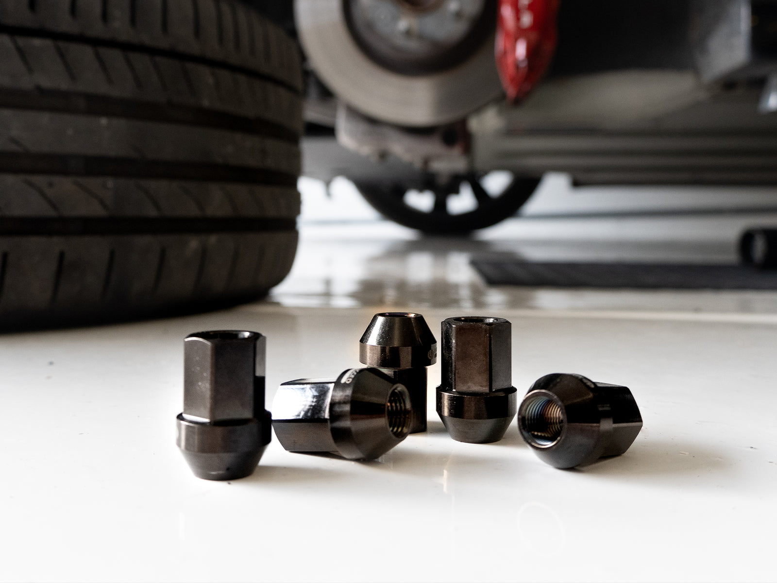 Lightweight Titanium Lug Nuts for your Tesla