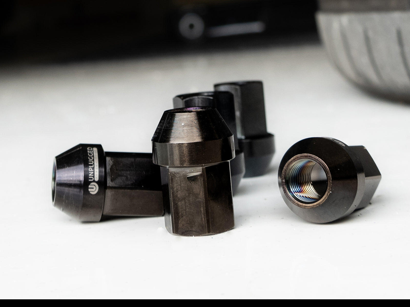 Lightweight Titanium Lug Nuts for your Tesla